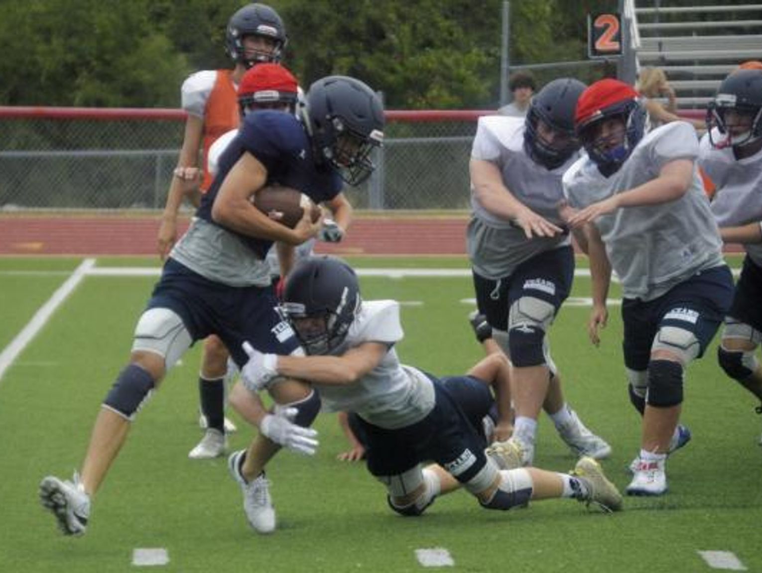 Texan football preps for Davenport scrimmage